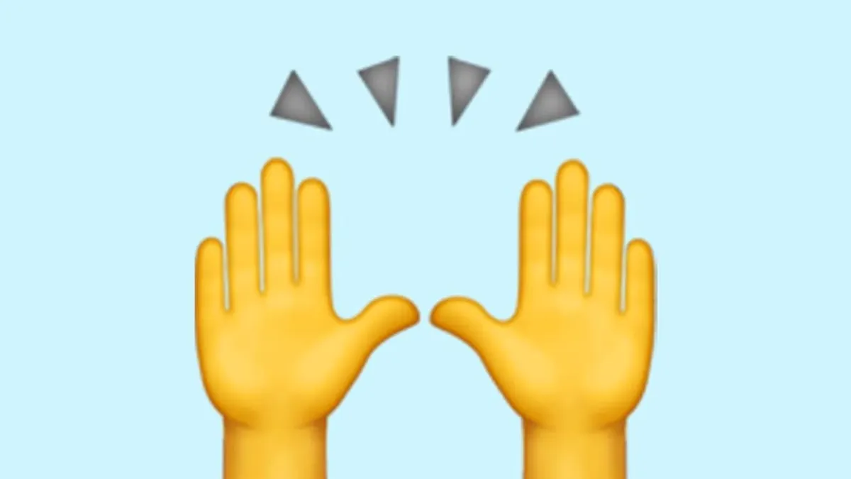 Qué significa usar el emoji de las manos abiertas en WhatsApp