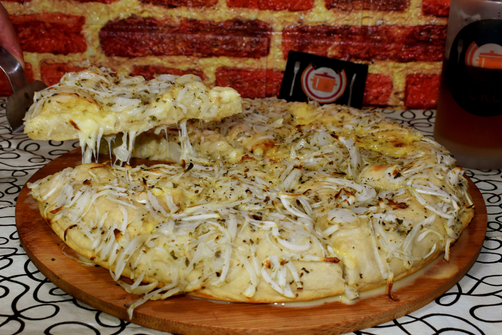 Cómo hacer la mejor fugazzeta rellena: la receta de pizzería que no hay ...